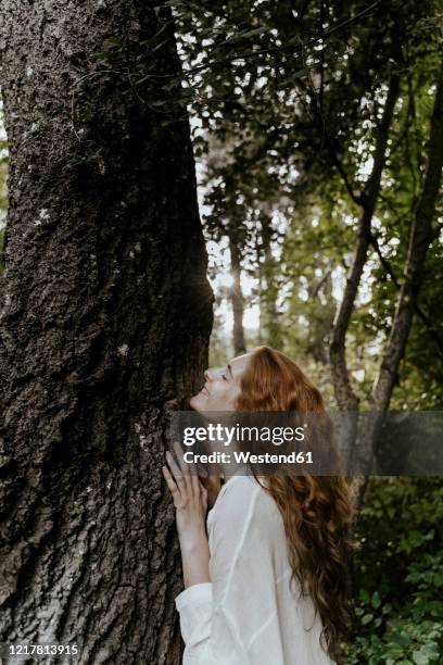 Tree Hugging Woman Photos And Premium High Res Pictures Getty Images