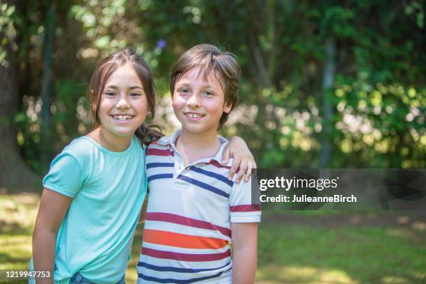 Brother With Arm Around Sister Photos And Premium High Res Pictures