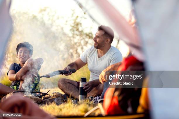 Father Son Smoking Photos And Premium High Res Pictures Getty Images