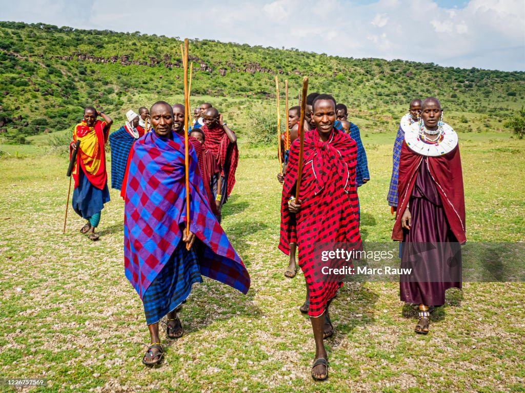 A Group Of Maasai People Performing A Welcoming Dance In The Ngorongoro