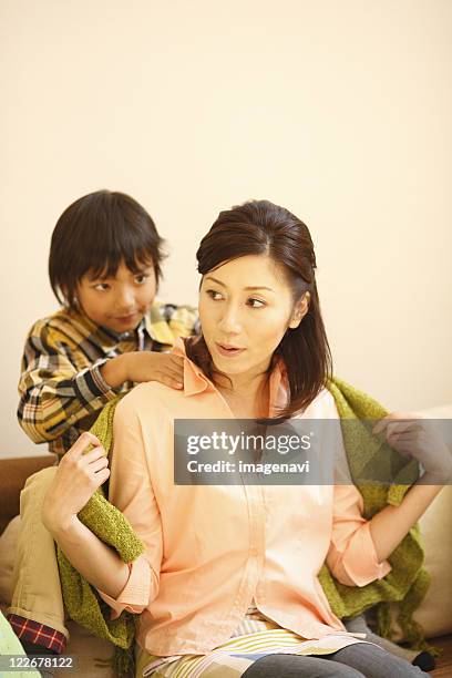 Son Massage Mom Photos And Premium High Res Pictures Getty Images