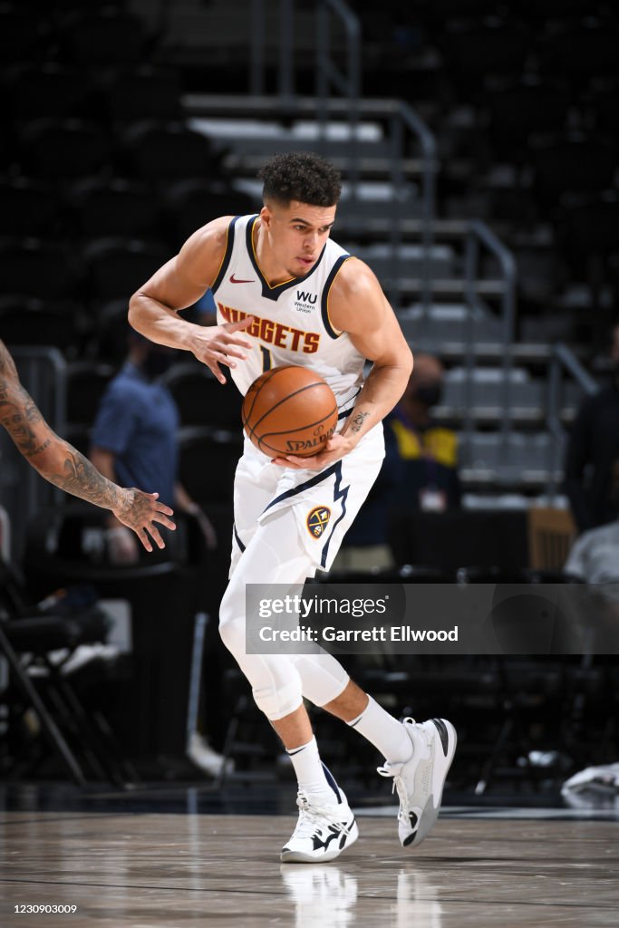 Michael Porter Jr 1 Of The Denver Nuggets Dribbles During The Game