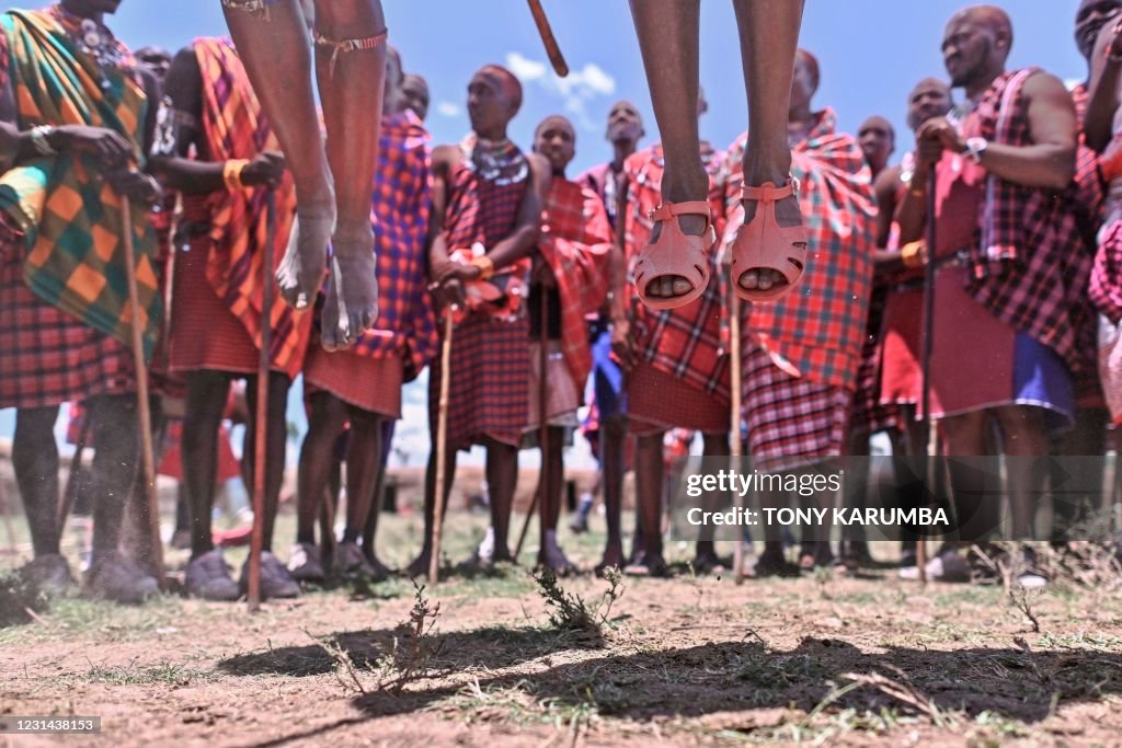 Men From The Kenyan Maasai Tribe Perform A Traditional Jumping Ritual