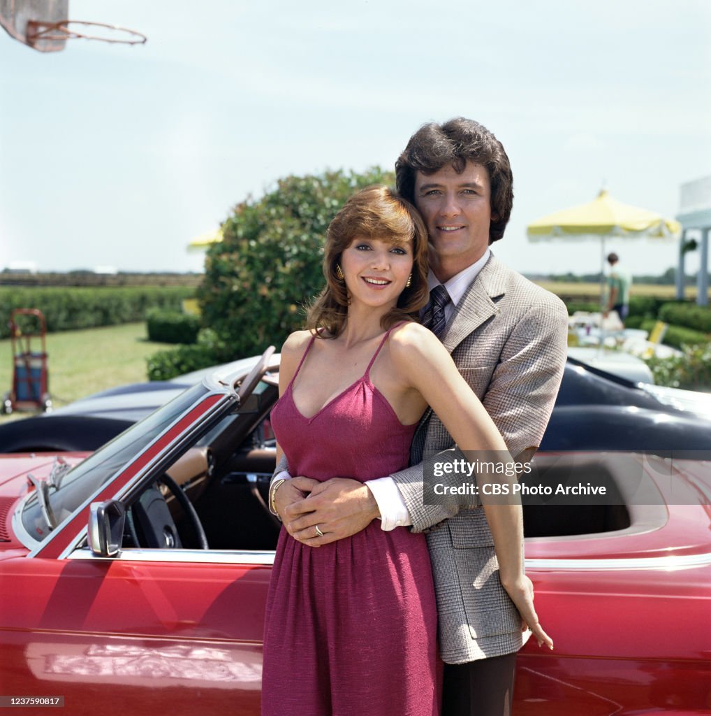 Dallas Patrick Duffy As Bobby Ewiing And Victoria Principal As News