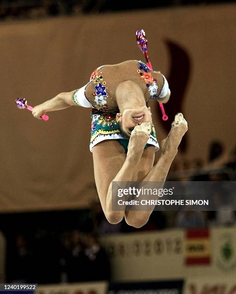 Russian Gymnast Alina Kabaeva Performs With The Clubs During The Xxiv