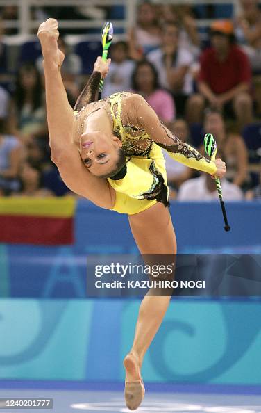 Alina Kabaeva Of Russia Performs With Clubs At The Gymnastics News