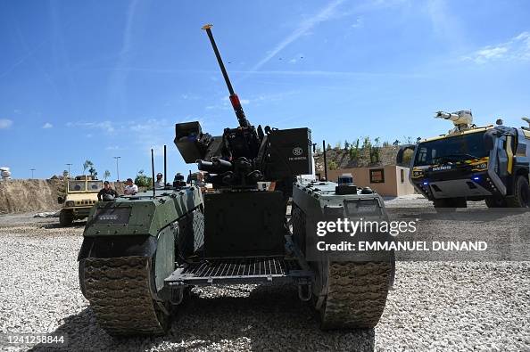 A Milrem Robotics FN Herstal and a Sides Sentinel 6X6 125/15 25 stand ... A Milrem Robotics FN Herstal and a Sides Sentinel 6X6 125/15 25 stand ...