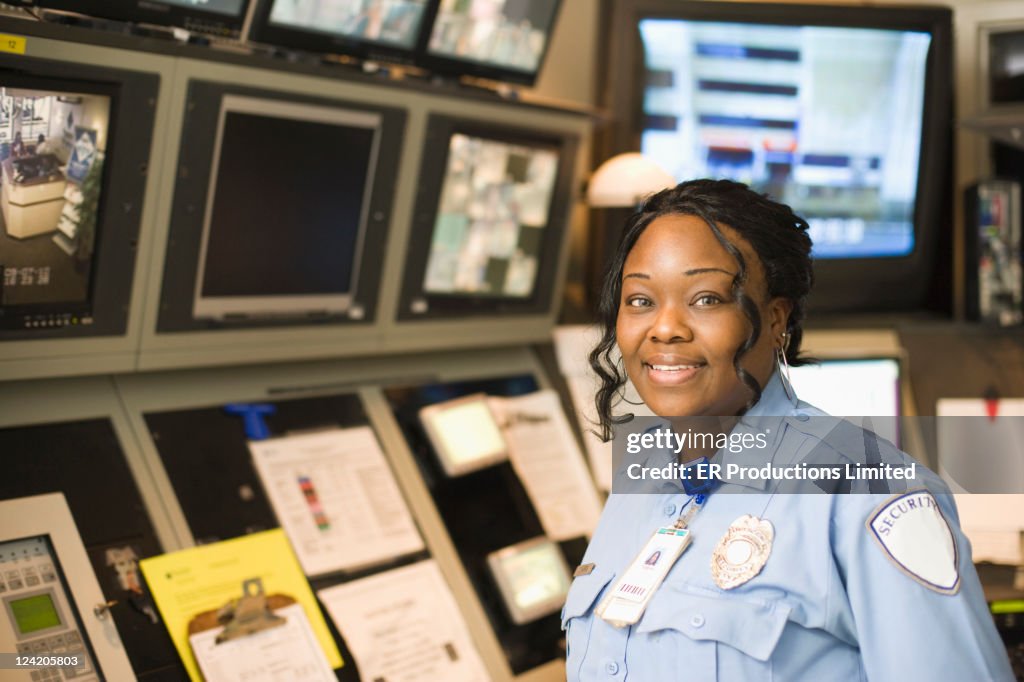 African American Security Guard In Control Room High-Res Stock Photo ... African American Security Guard In Control Room High-Res Stock Photo ...