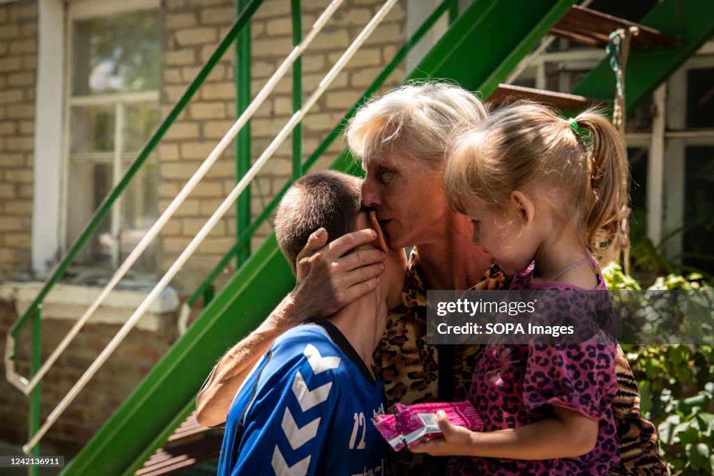 Mother Rita Kisses Her Son Igor While Hugging Lila She Now Takes