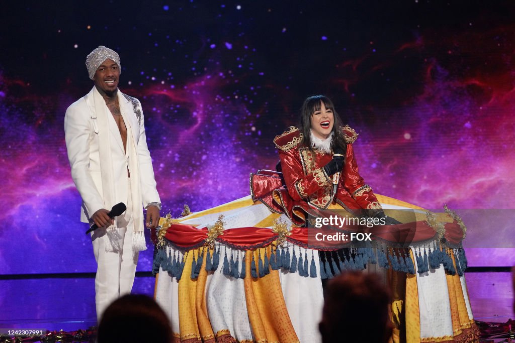Host Nick Cannon And Hayley Orrantia In The Masked Singer Season