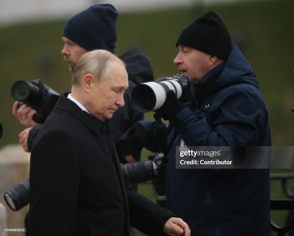 Russian President Vladimir Putin Walks Past The Photographers Leaving