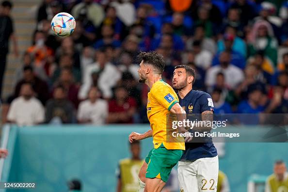 Aziz Behich Of Australia And Theo Hernandez Of France Battle For The