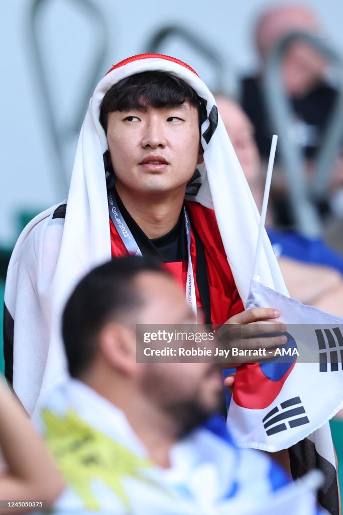 A Fan Of Korea Republic During The Fifa World Cup Qatar 2022 Group H