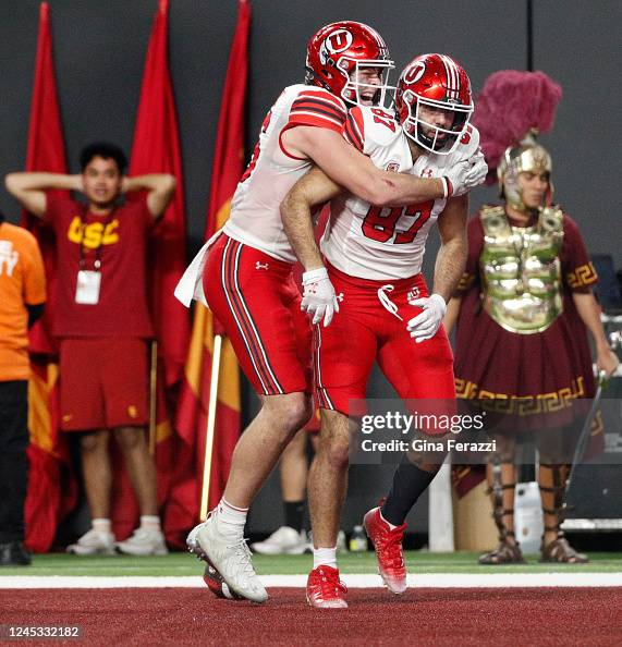Utah Utes tight end Dalton Kincaid hugs Utah Utes tight end Thomas ... Utah Utes tight end Dalton Kincaid hugs Utah Utes tight end Thomas ...