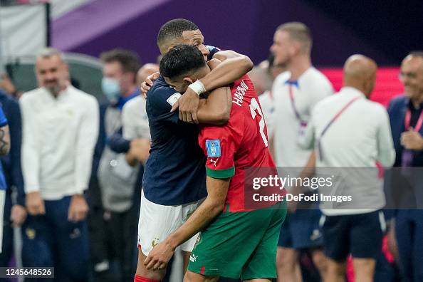 Kylian Mbappe Of France And Achraf Hakimi Of Morocco Hug Each Other