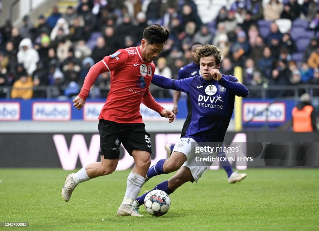 Rwdm's Luis Oyama and RSCA Futures' Loic Masscho fight for the ball ... Rwdm's Luis Oyama and RSCA Futures' Loic Masscho fight for the ball ...