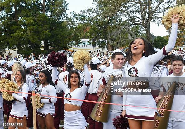 The Florida State University Cheerleaders Perform At A Battle Of The