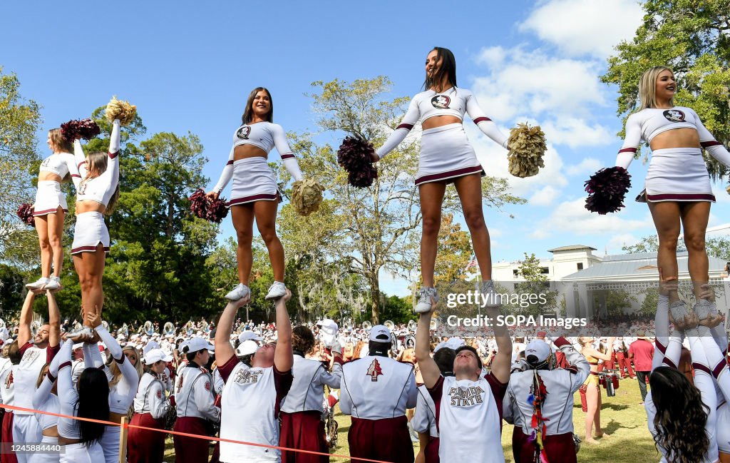 The Florida State University Cheerleaders Perform At A Battle Of The