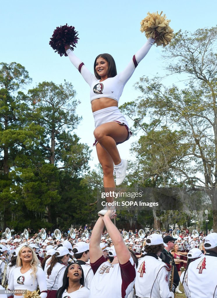 The Florida State University Cheerleaders Perform At A Battle Of The
