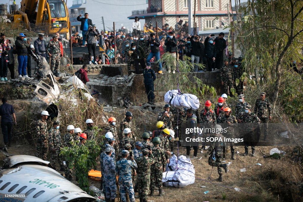 Nepal army, Police officers, and Armed Police Force Rescuers recover ... Nepal army, Police officers, and Armed Police Force Rescuers recover ...