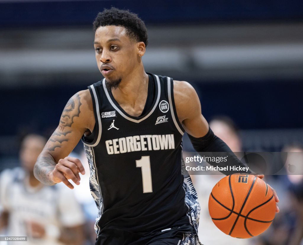 Primo Spears of the Georgetown Hoyas brings the ball up court during ... Primo Spears of the Georgetown Hoyas brings the ball up court during ...
