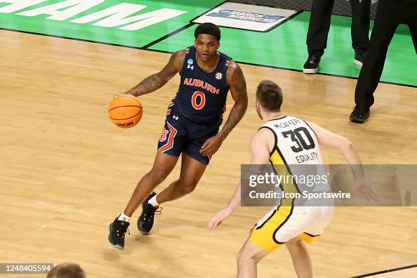 Auburn Tigers guard K.D. Johnson during the game between the Iowa ... Auburn Tigers guard K.D. Johnson during the game between the Iowa ...