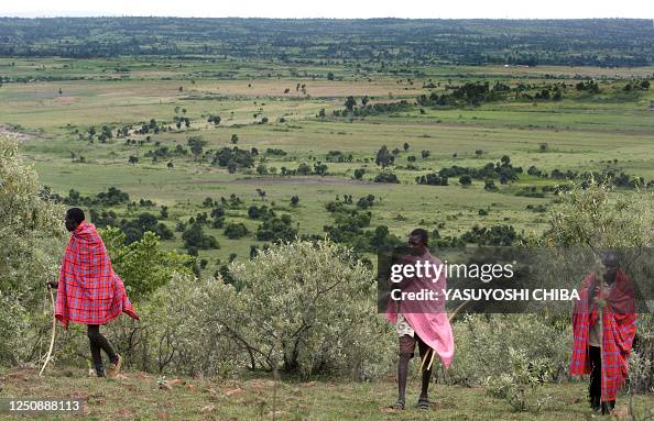 Massai Warriors Armed With Bows Keep Watch For Members Of The News Photo Getty Images