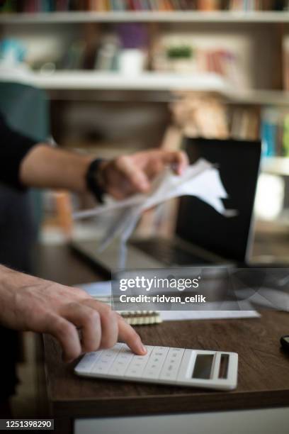 Paycheck Calculator Photos And Premium High Res Pictures Getty Images
