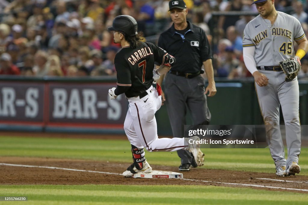 Arizona Diamondbacks left fielder Corbin Carroll rounds first base ... Arizona Diamondbacks left fielder Corbin Carroll rounds first base ...