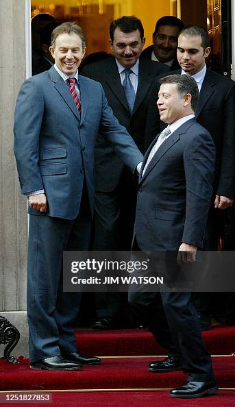 Topshot British Prime Minister Tony Blair Smiles As He Exits No 10
