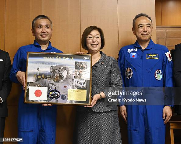 Japanese Astronauts Satoshi Furukawa And Koichi Wakata Pose For A