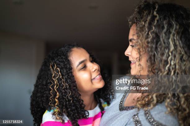 Two Girls Touching Each Other Photos And Premium High Res Pictures