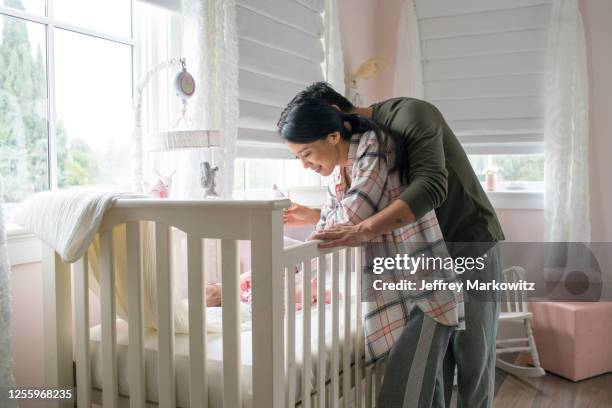 Couple Crib Photos And Premium High Res Pictures Getty Images