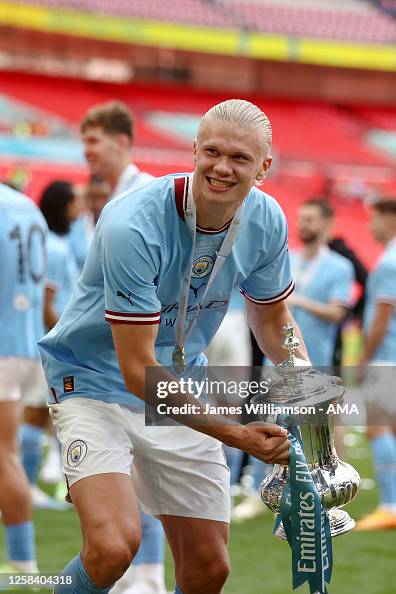 Erling Haaland Of Manchester City Celebrates With The Fa Cup Trophy
