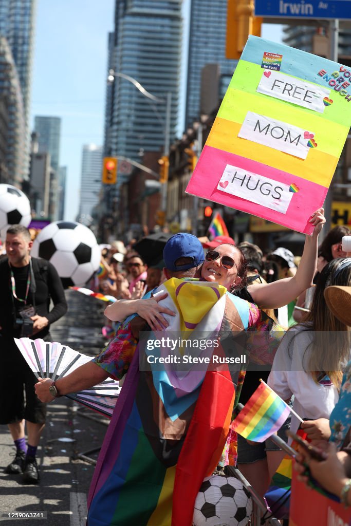 Toronto On June 25 A Spectator Offers Hugs To Paraders As News Photo Getty Images