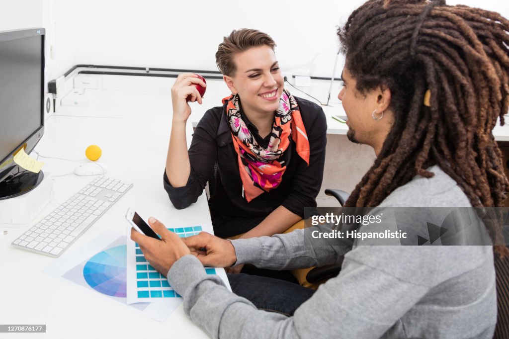 Happy Diverse Coworkers Relaxing During A Small Break At The Office