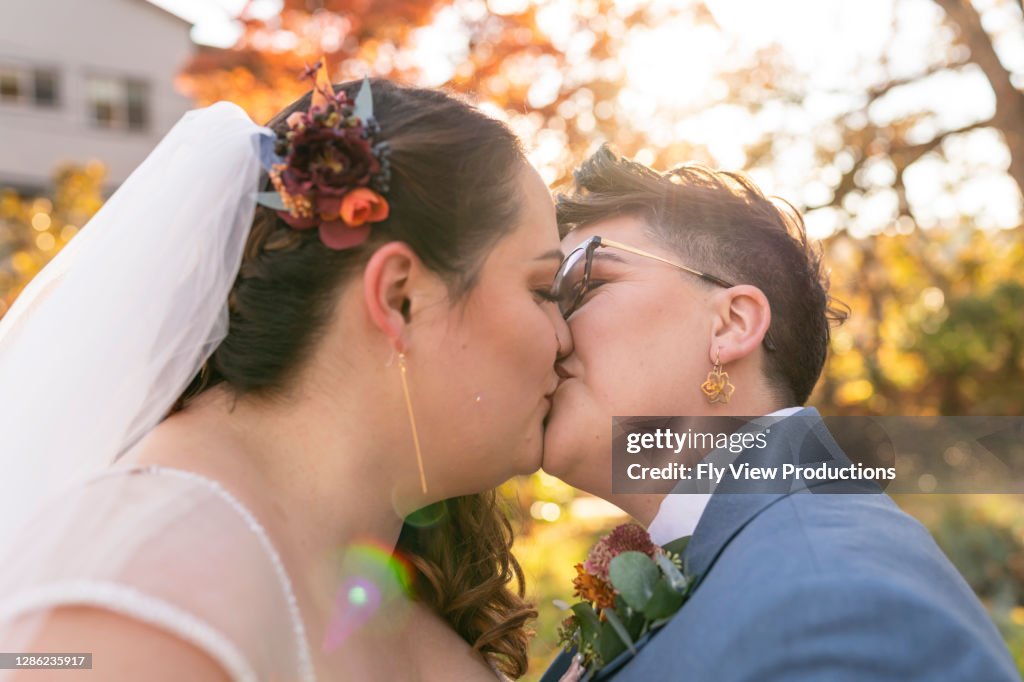 Just Married Lesbian Couple Kiss During Outdoor Wedding Ceremony High