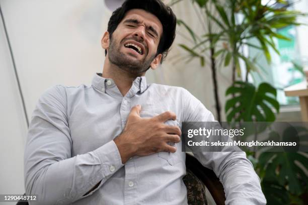 261 Hand Clutching Chest Stock Photos, High-Res Pictures, and Images ... 261 Hand Clutching Chest Stock Photos, High-Res Pictures, and Images ...