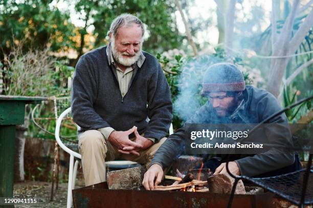 Father Son Smoking Photos And Premium High Res Pictures Getty Images