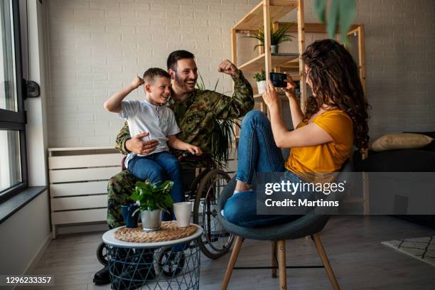 Veteran Wheelchair Family Photos and Premium High Res Pictures - Getty ... Veteran Wheelchair Family Photos and Premium High Res Pictures - Getty ...
