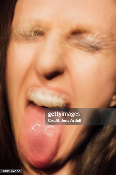 Portrait Of A Young Woman Making A Disgusted Face Fotografías E