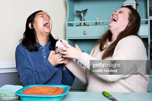 Woman Laughing Hysterically Photos And Premium High Res Pictures