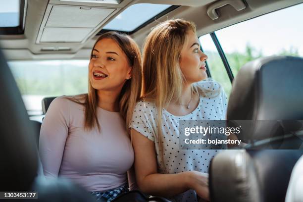 Two Women Backseat Car Photos And Premium High Res Pictures Getty Images