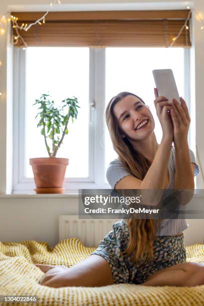 Young Women Taking Selfies In Bed Photos And Premium High Res Pictures Getty Images