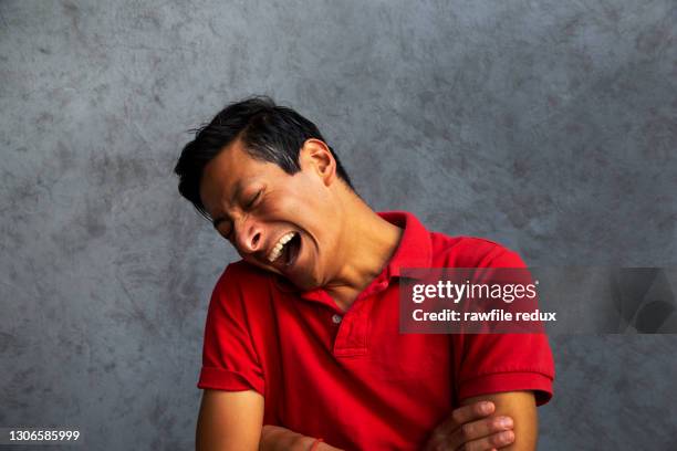 Man Laughing Hysterically Photos And Premium High Res Pictures Getty