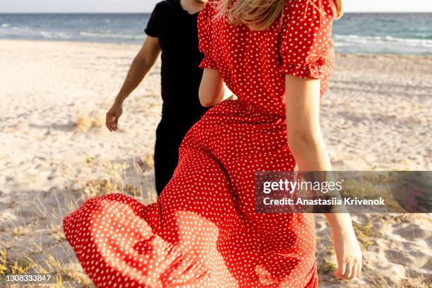 Two Men Holding Hands Beach Photos And Premium High Res Pictures Getty Images