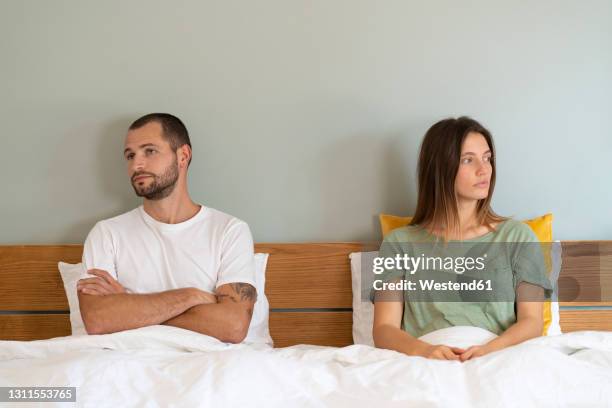 Couple Looking At Each Other Sad Photos And Premium High Res Pictures