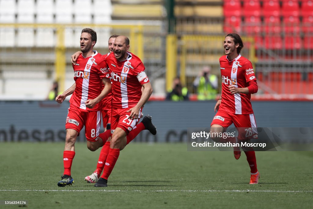 Andrea Barberis of AC Monza celebrates with team mate Carlos Augusto ... Andrea Barberis of AC Monza celebrates with team mate Carlos Augusto ...
