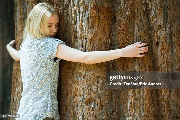 Tree Hugging Woman Photos And Premium High Res Pictures Getty Images