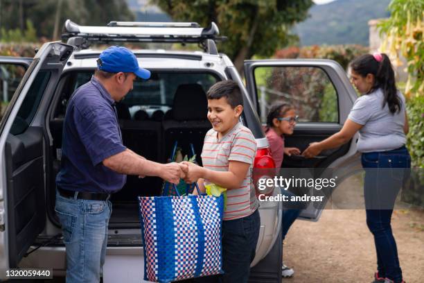 Unloading Grocery Car Photos and Premium High Res Pictures - Getty Images Unloading Grocery Car Photos and Premium High Res Pictures - Getty Images